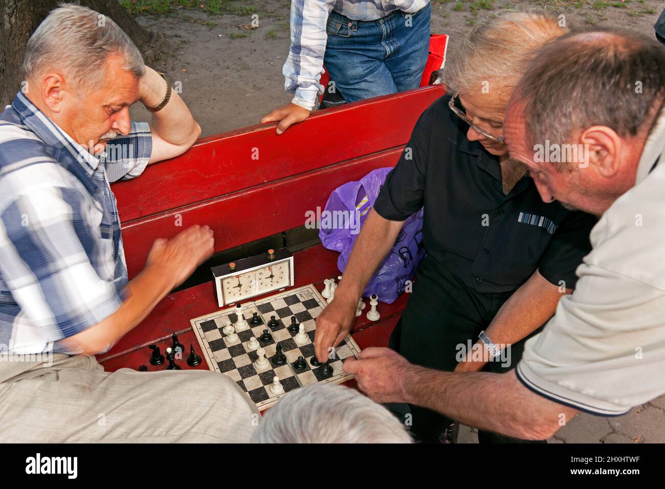 Old men playing speed chess, city centre, L'viv, Ukraine Stock Photo ...