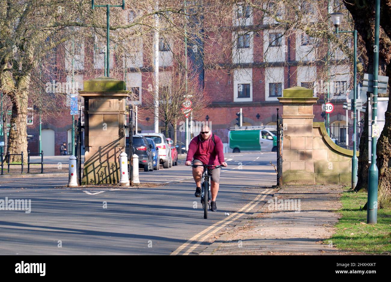 Man riding a bike towards the camera Stock Photo - Alamy
