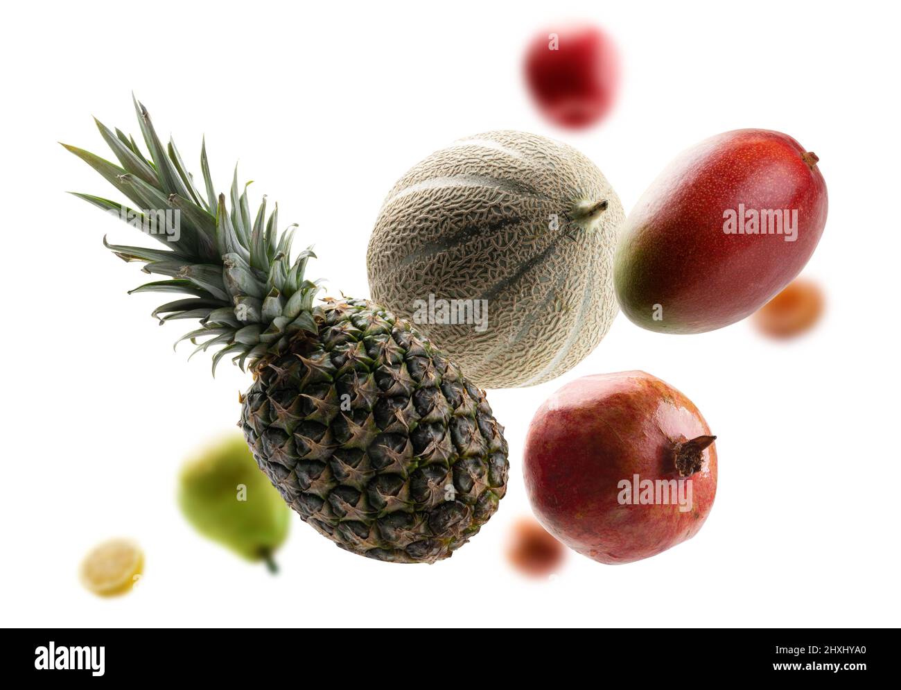 Fresh fruits levitate on a white background Stock Photo - Alamy