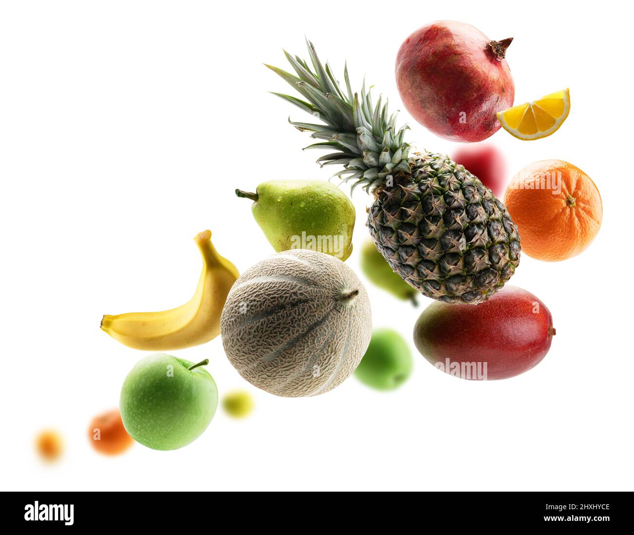 Fresh fruits levitate on a white background Stock Photo - Alamy