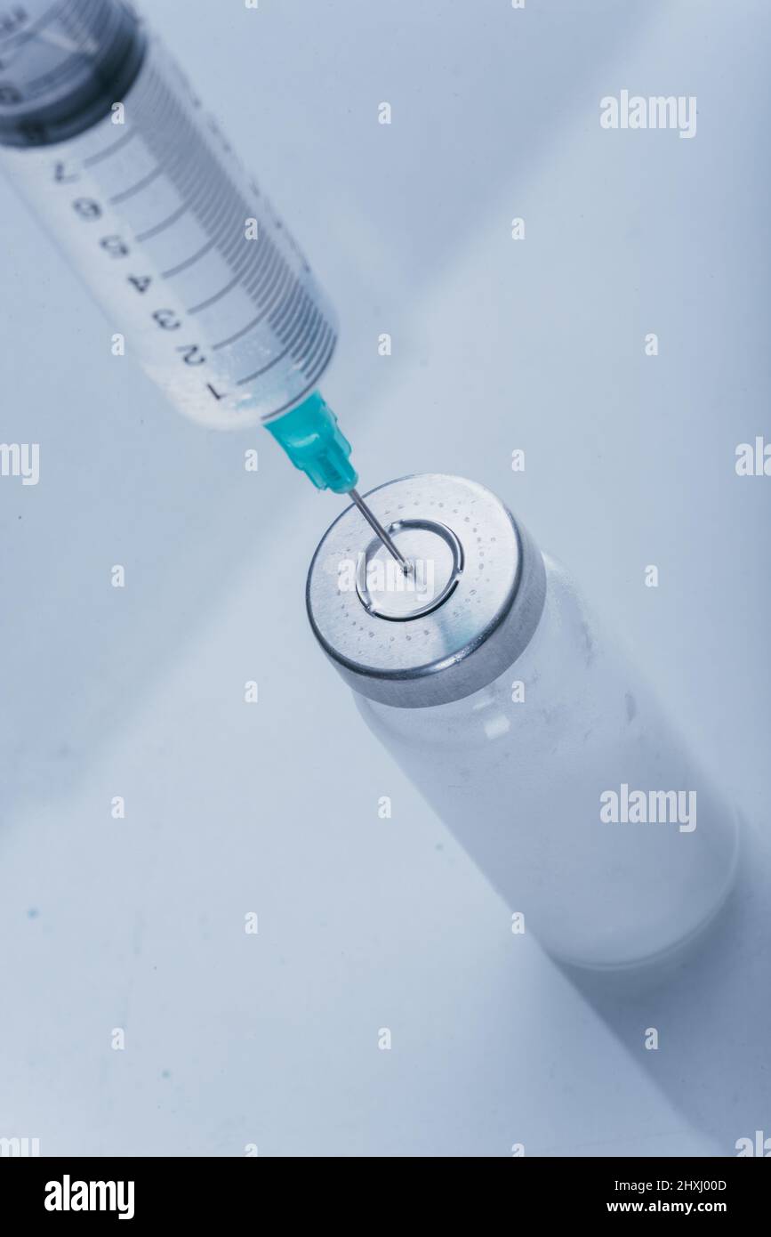 Medicine, Injection, vaccine and disposable syringe, drug concept ...