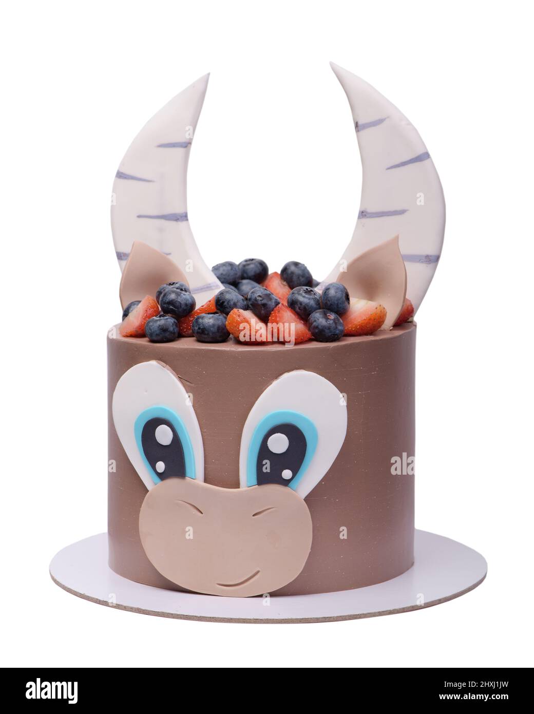 Bull head decorative cake isolated on white background Stock Photo - Alamy