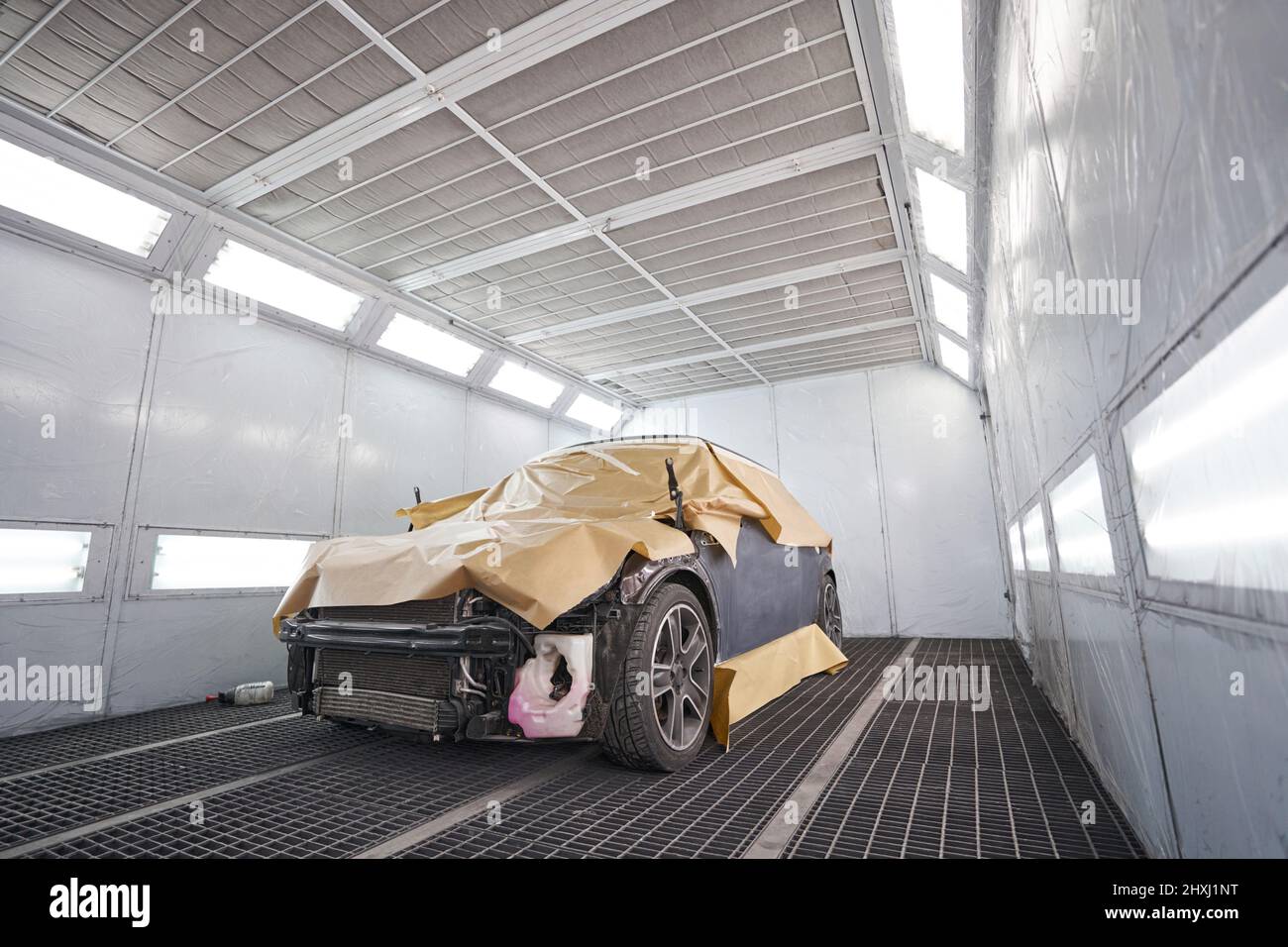 Auto preparation process before painting in garage Stock Photo - Alamy