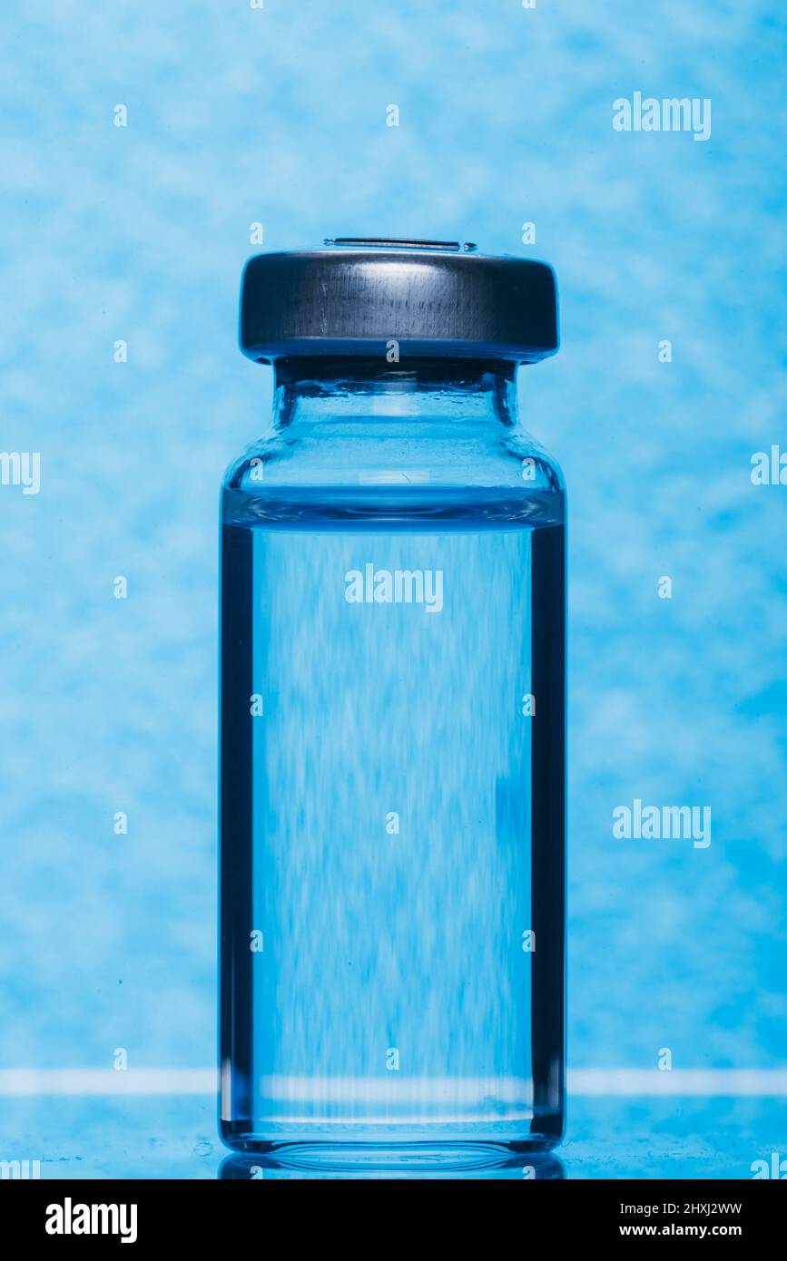 Glass medical ampoule vial for injection. Medicine is liquid sodium ...