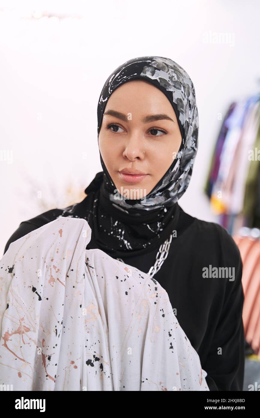 Muslim designer hi-res stock photography and images - Alamy