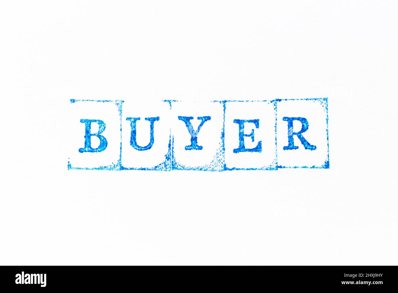 Blue color ink rubber stamp in word buyer on white paper background ...
