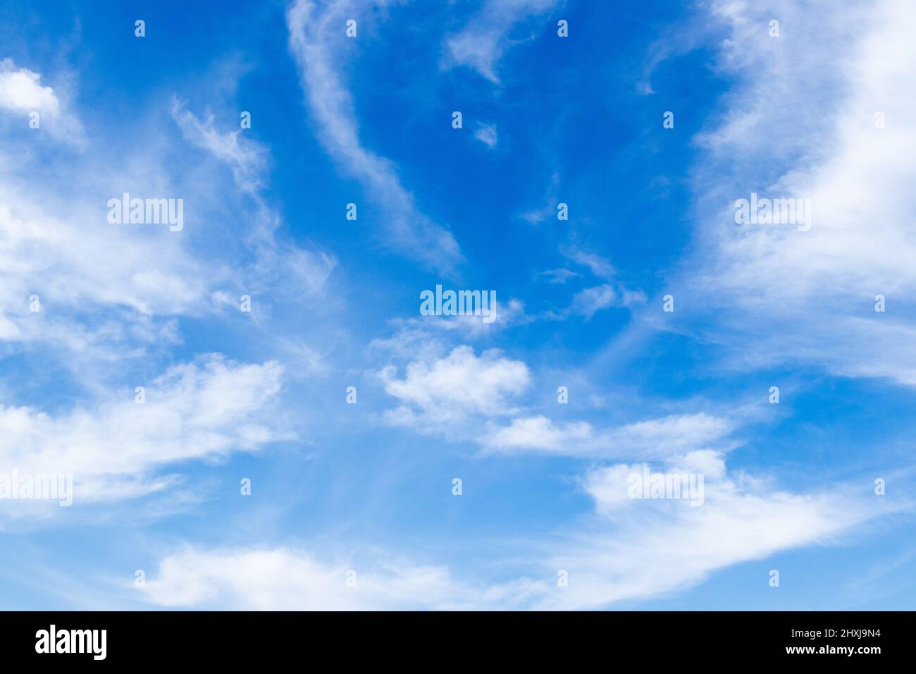 Clear blue color sky with white cloud background Stock Photo - Alamy