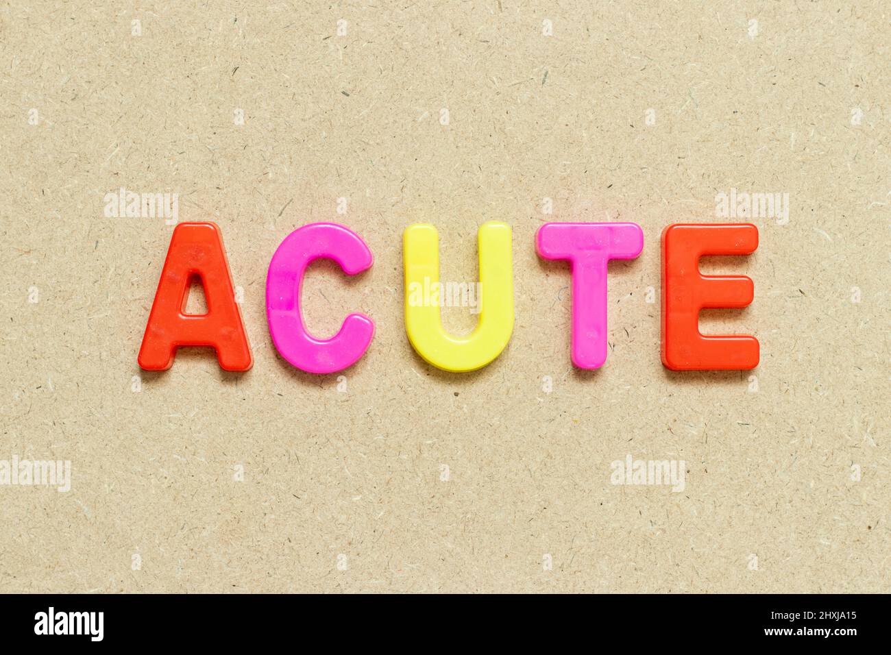 Color alphabet letter with word acute on wood background Stock Photo ...