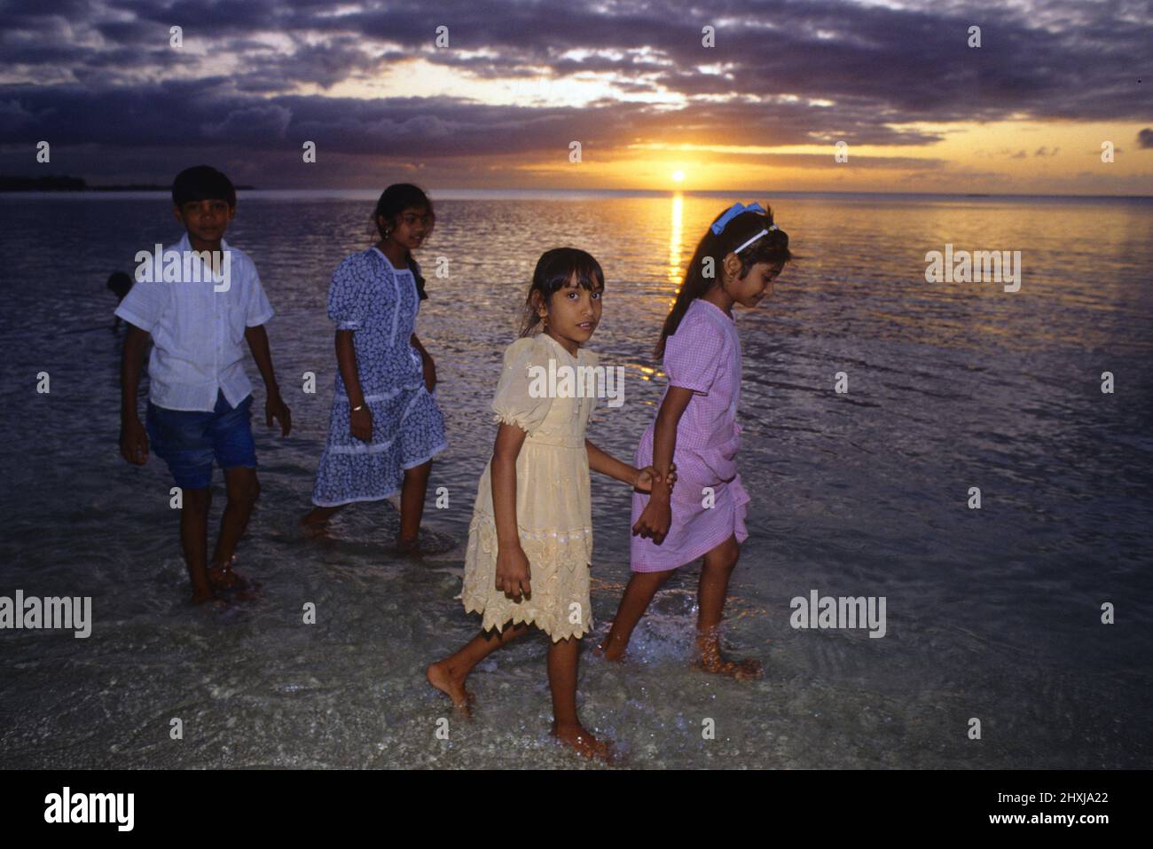 Children mauritius island beach sunset Stock Photo - Alamy