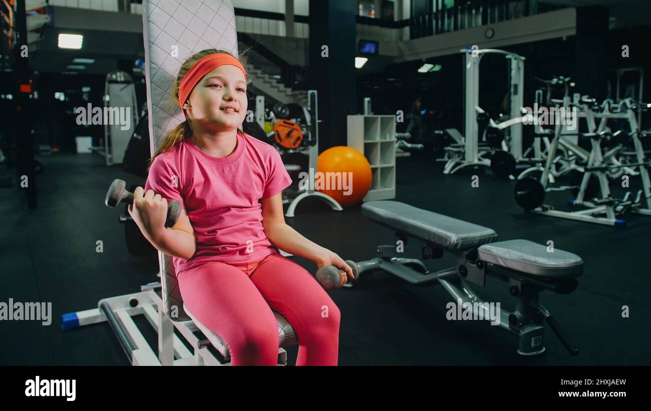 Fit Athletic Baby Girl Work out with Dumbbell, Doing Her Fitness ...