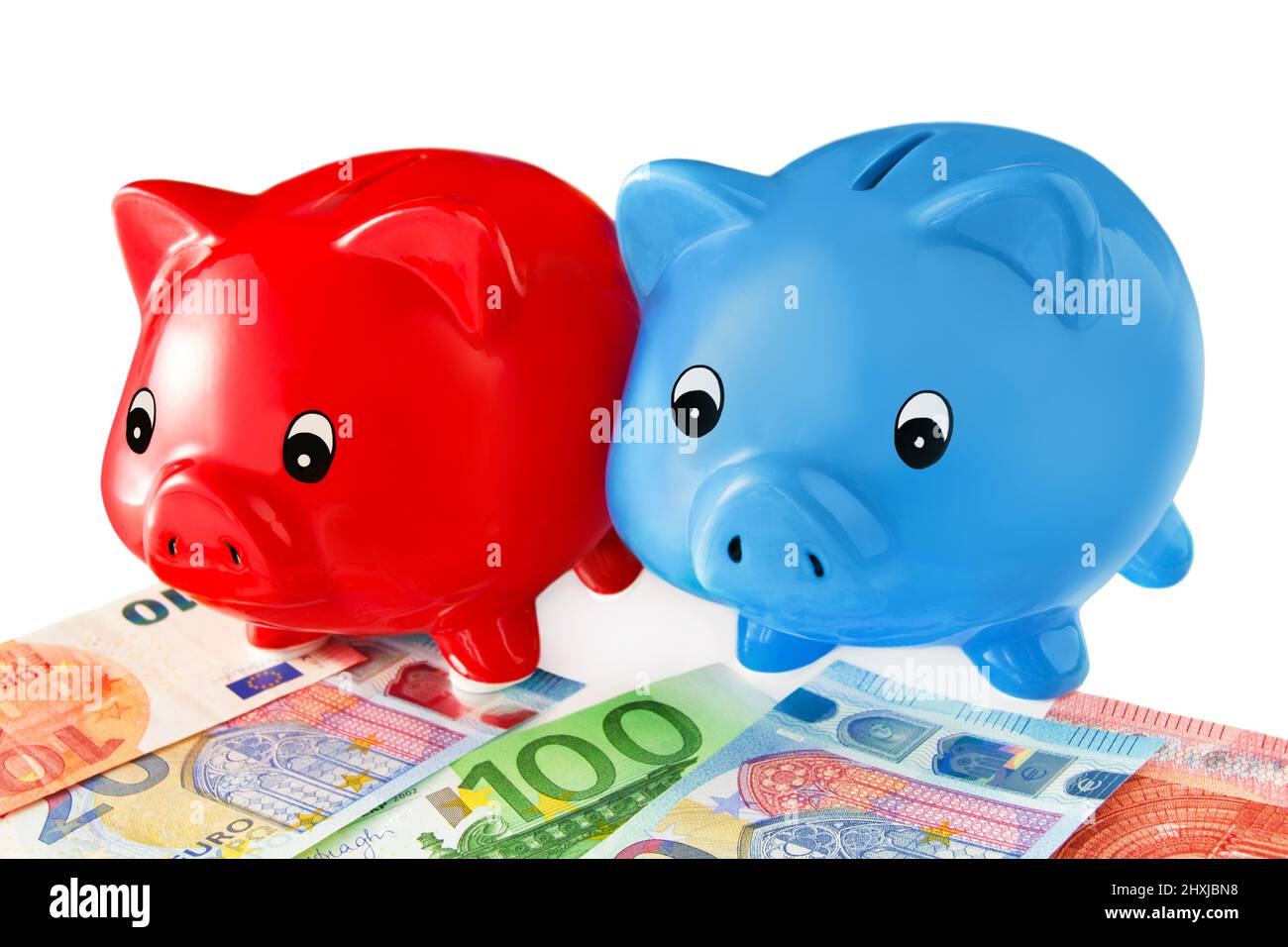 Finances and banking with 2 red and blue piggy banks and Euro banknotes ...
