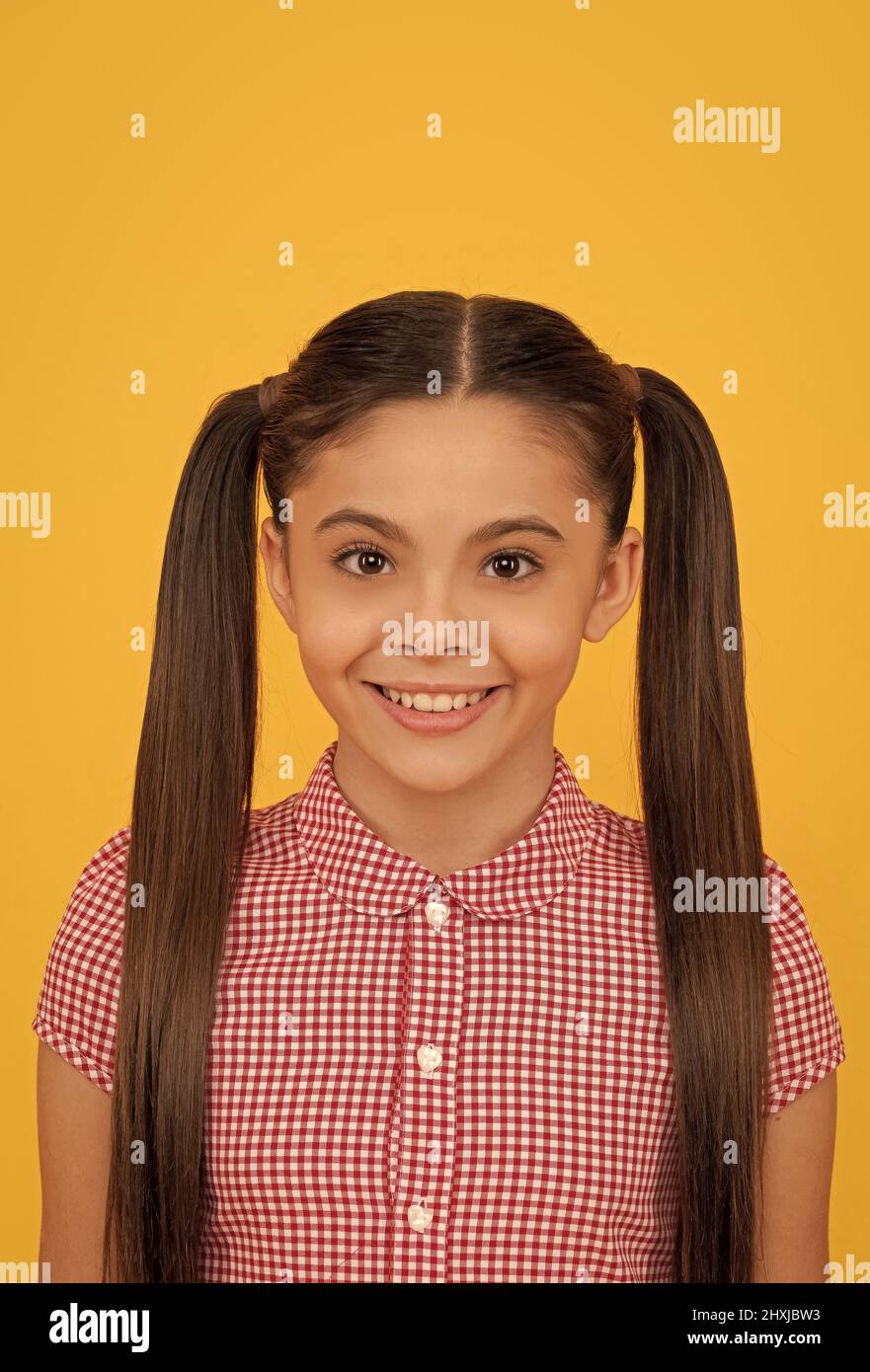 Smile lit up her face. Smiling child face. Happy girl portrait yellow ...