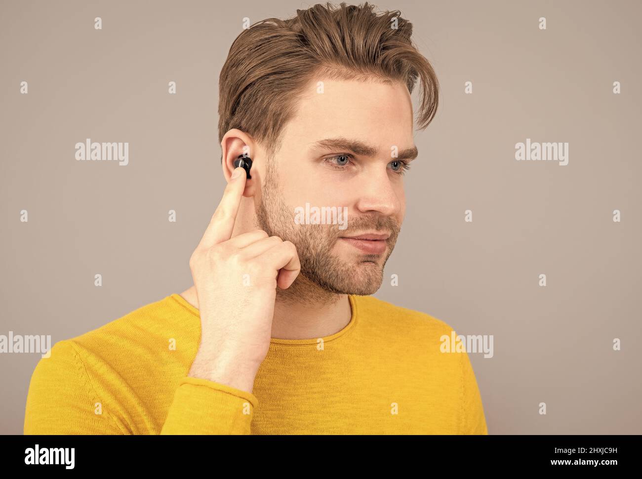 bluetooth headset device accessory. new bluetooth technology. Man point ...