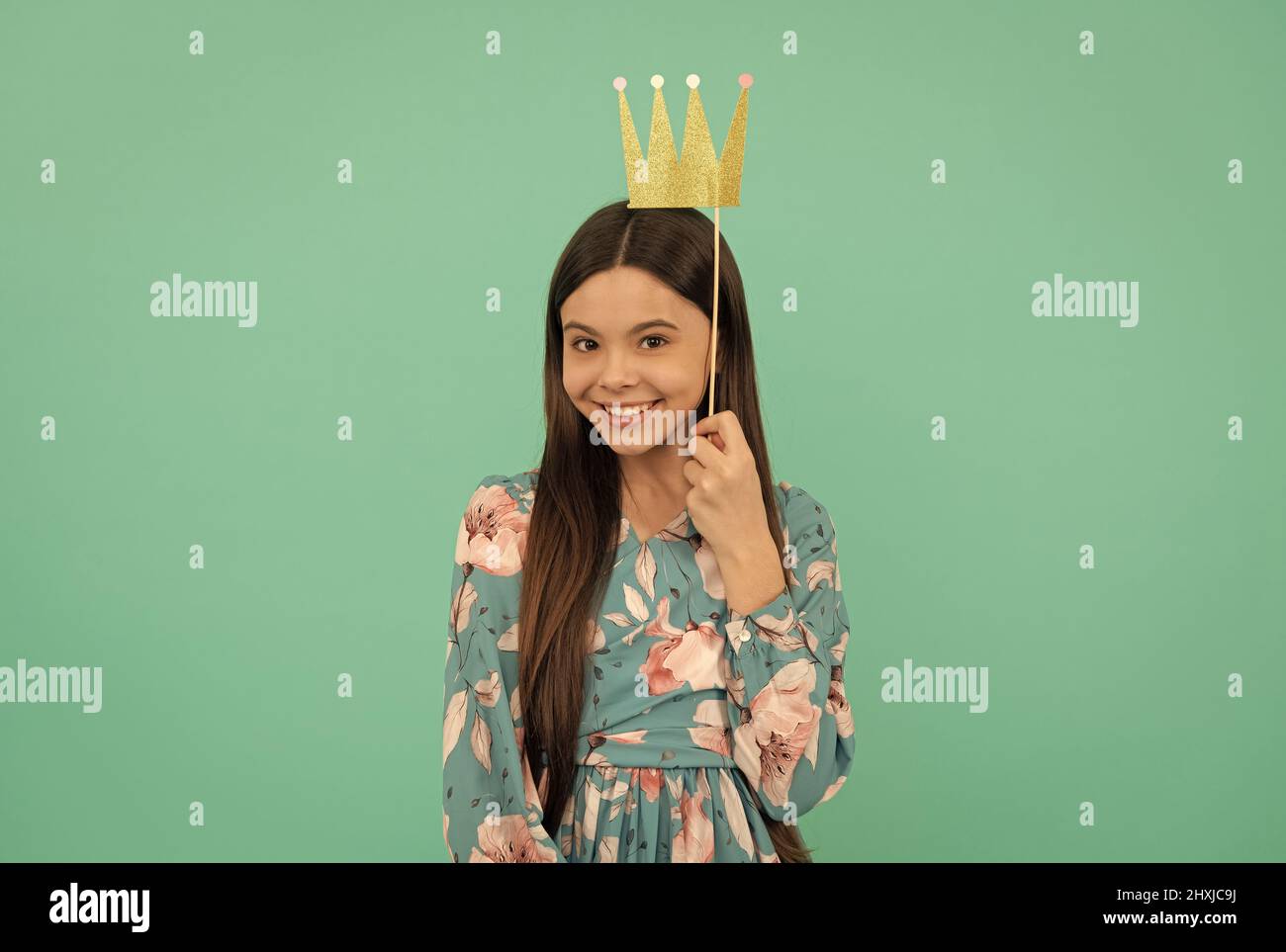 Prom party. Happy girl hold paper crown. Prom queen blue background ...