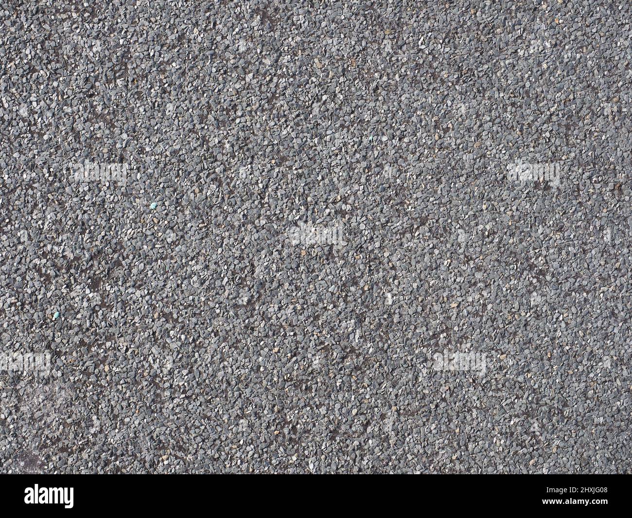 grey pebbles texture useful as a background Stock Photo - Alamy
