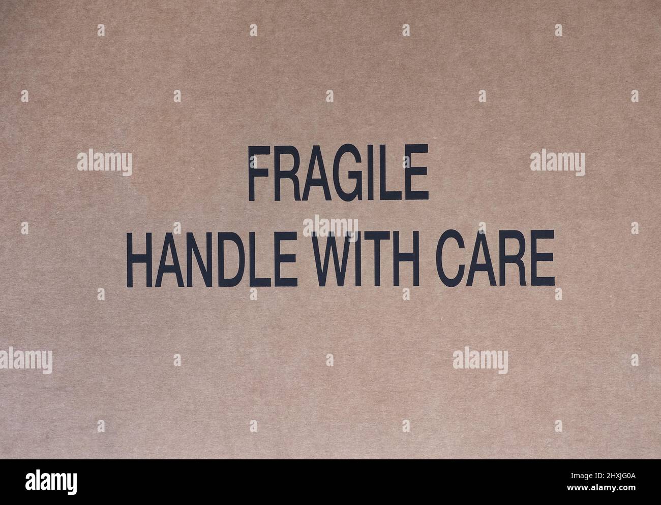 fragile handle with care sign on cardboard box Stock Photo - Alamy