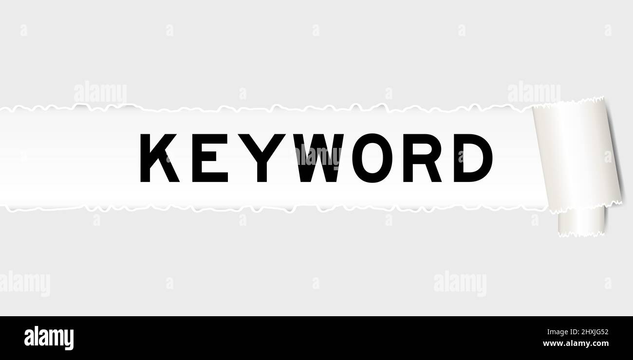 Ripped gray paper background that have word keyword under torn part ...