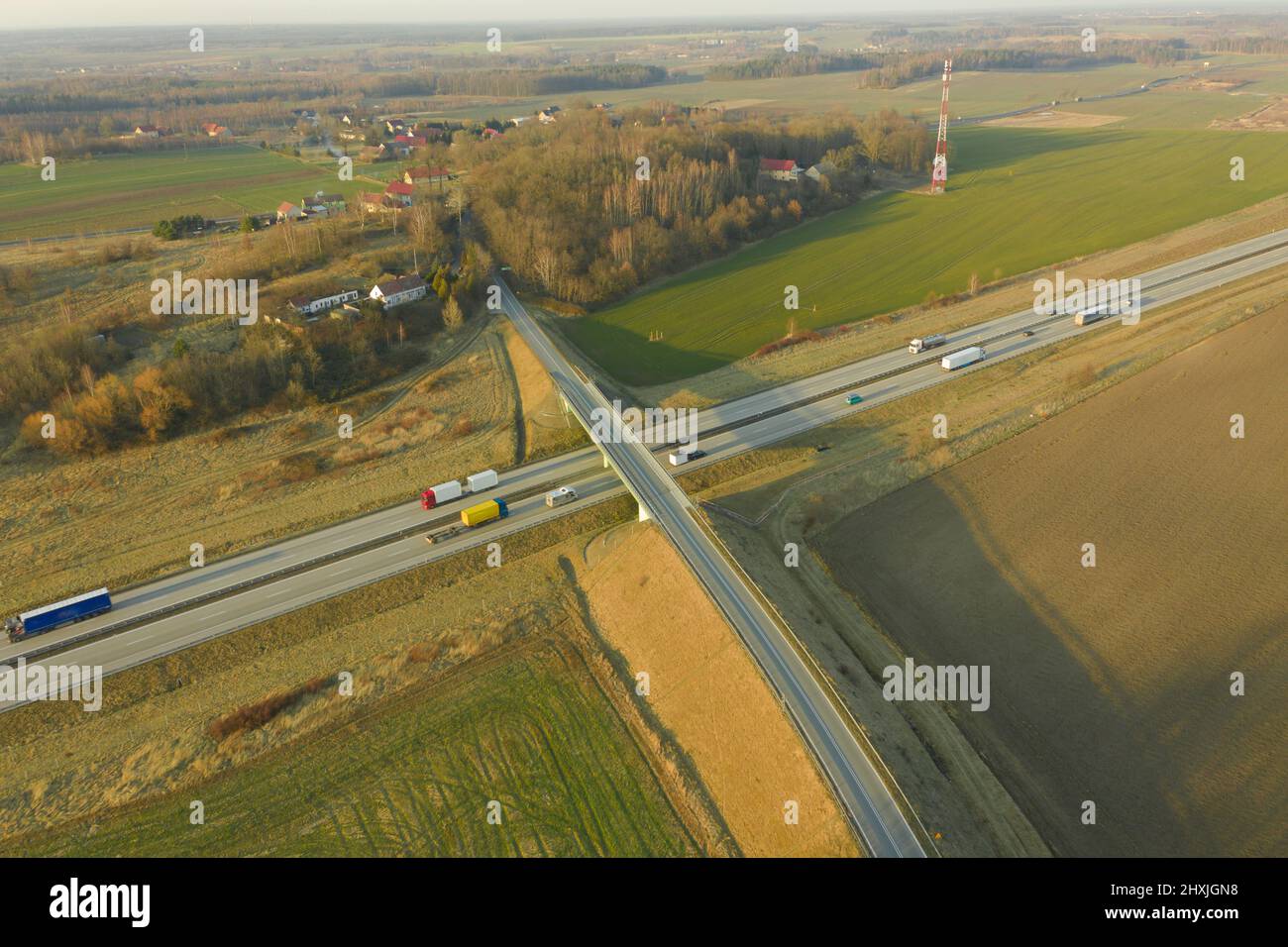 A vast plain, arable fields and meadows, in the center of the frame you ...