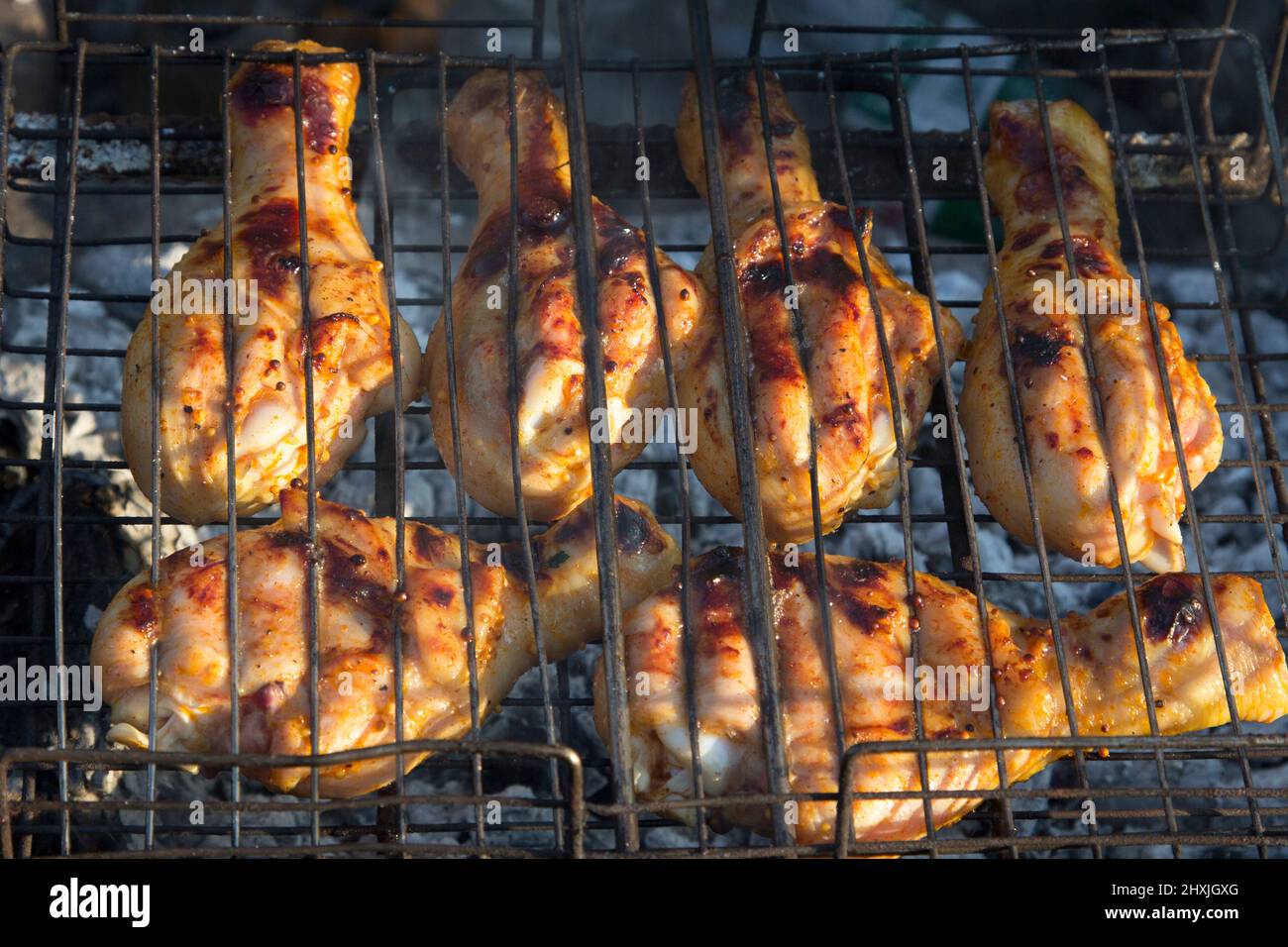 Chicken trees are fried on the barbecue Stock Photo - Alamy