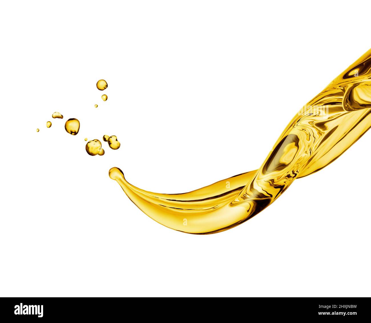 From a flying gush of golden yellow oil, individual drops of oil are ...