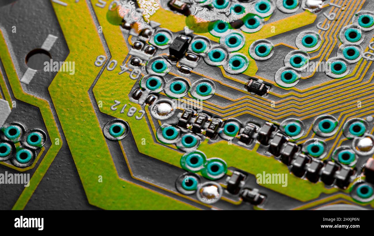 Macro Close up of printed wiring and components on PC circuit board ...