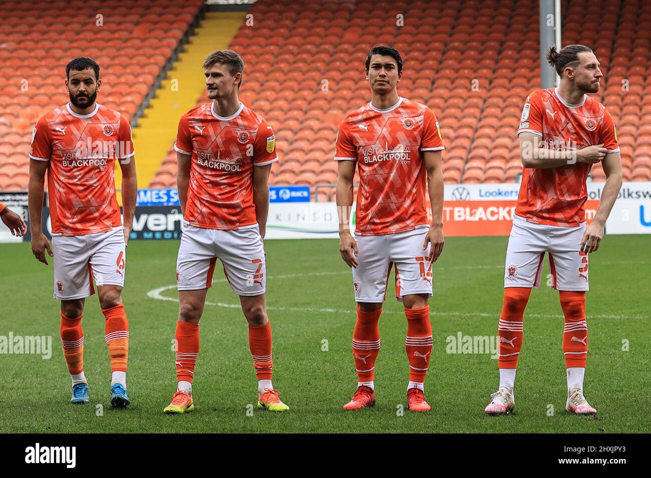 Kevin Stewart #6 of Blackpool, Callum Connolly #2 of Blackpool, Kenny ...