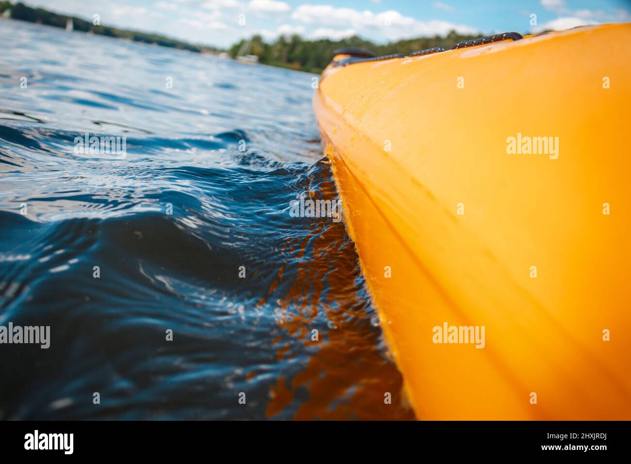Yellow kayak on a lake Stock Photo - Alamy