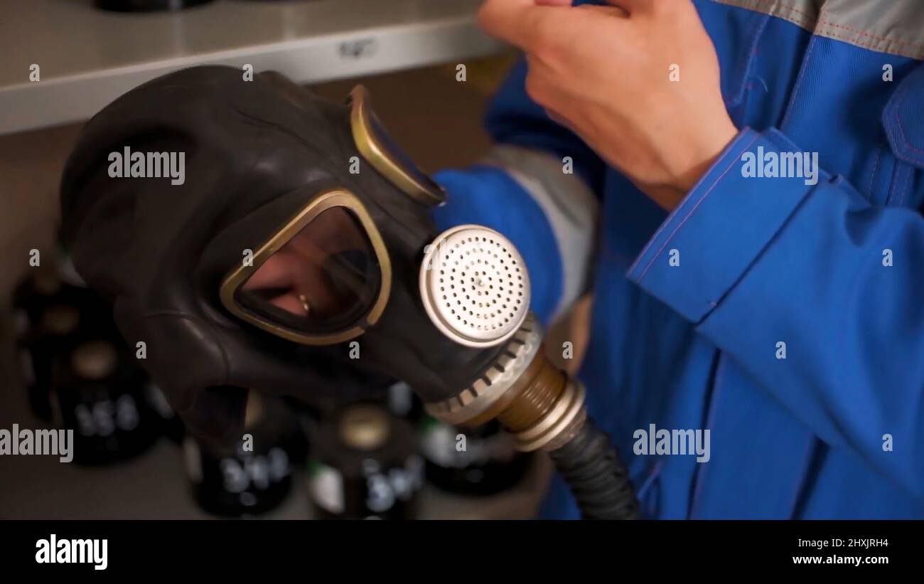 Checking gas masks. Clip. Testing of new gas masks in the workflow at ...