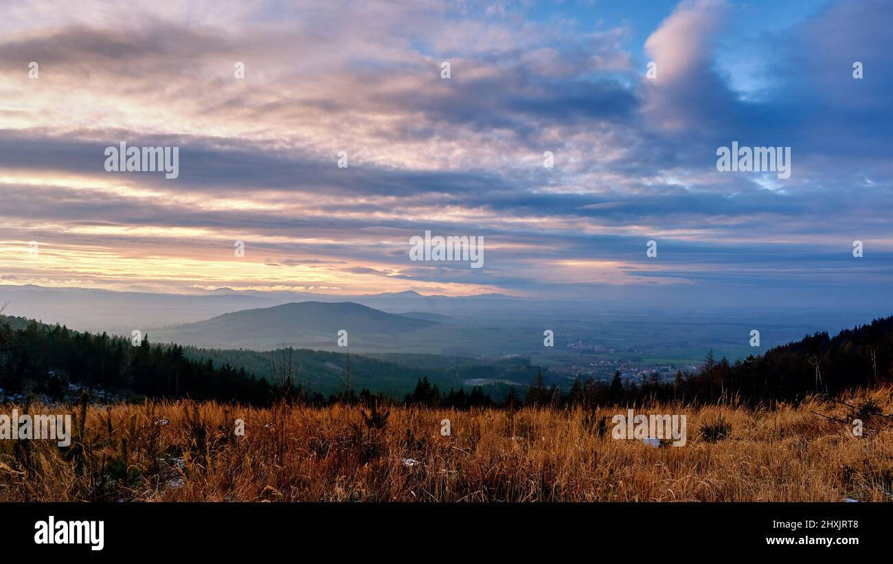 Sunset with dramatic cloudy sky over mountains shape, beautiful nature ...