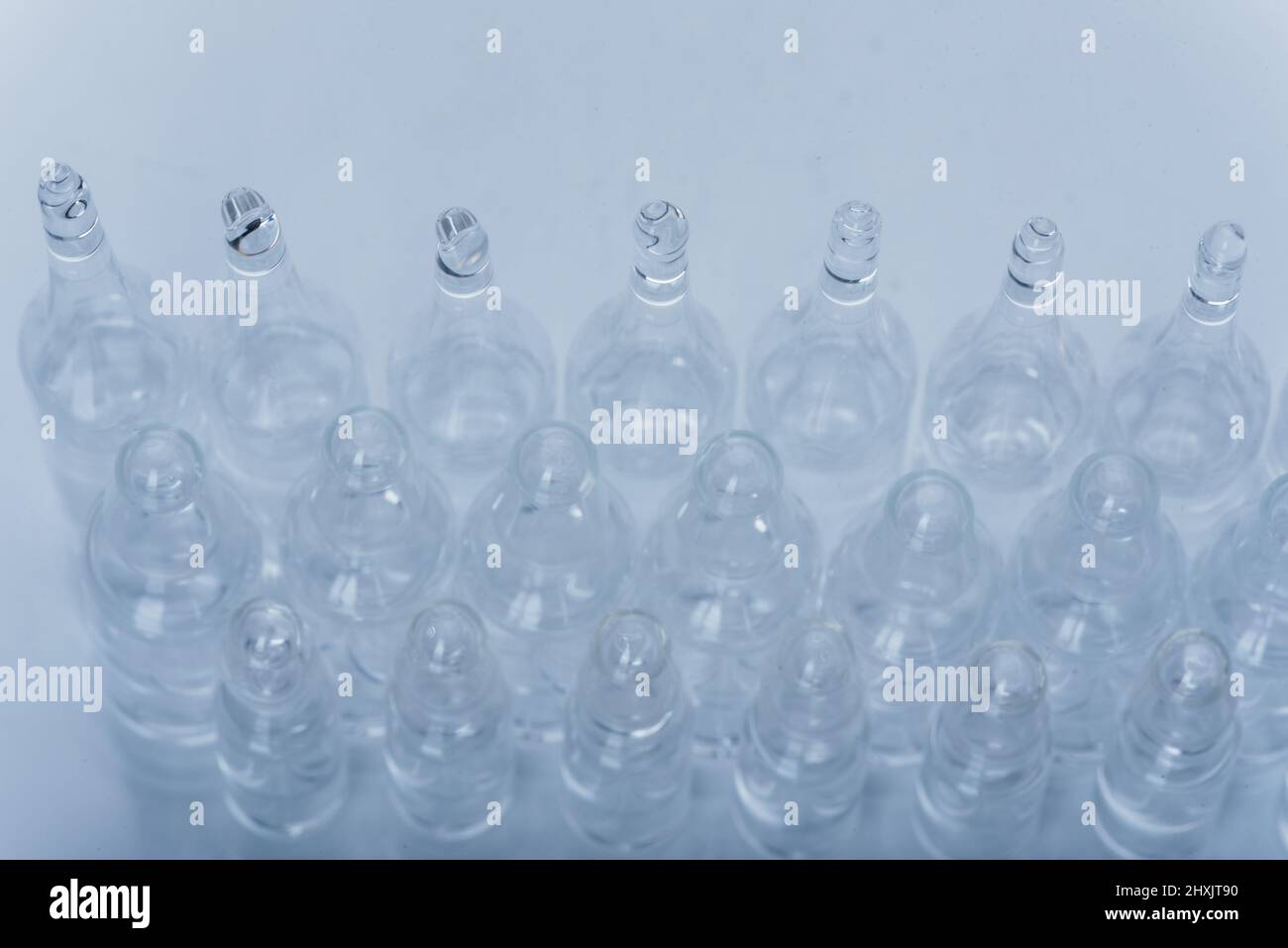 Glass medical ampoule vial for injection. Medicine is dry white drug ...