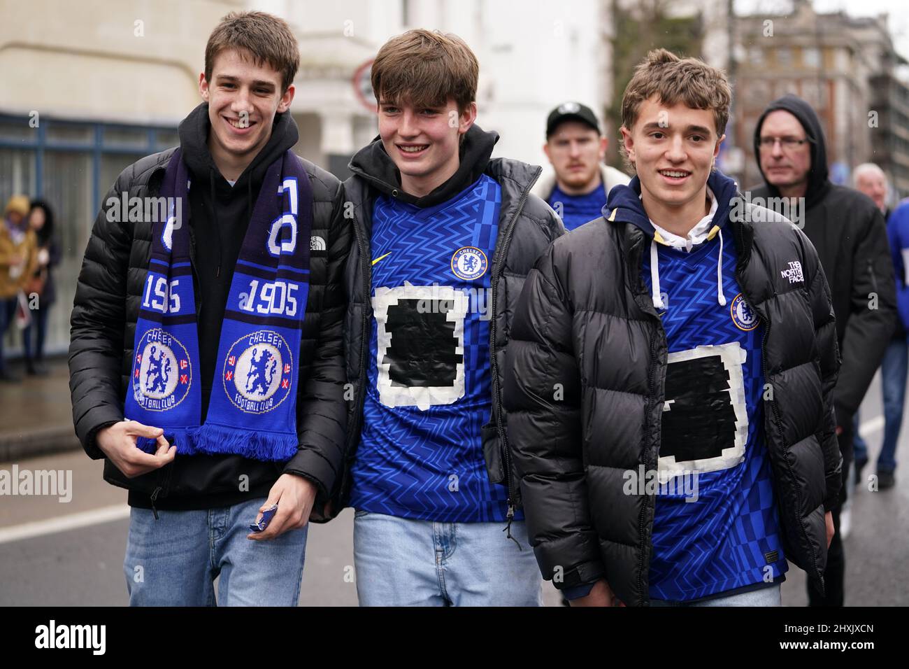 Chelsea fans with the '3' sponsor covered up before the Premier League ...