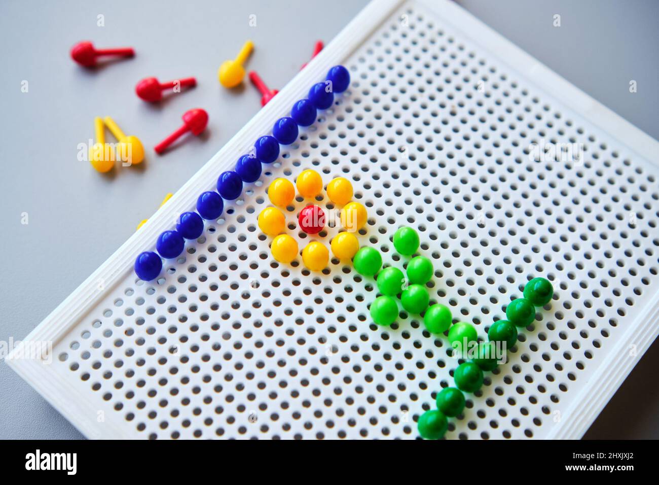 Children mosaic, a game for creativity. Mosaic with flower pattern ...