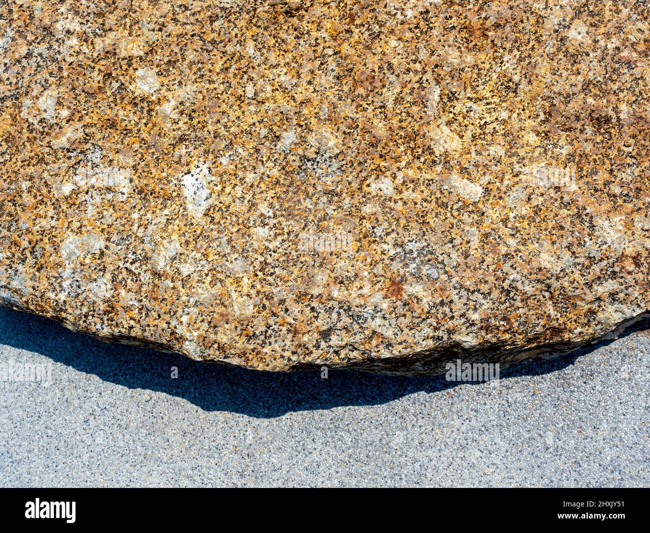 Yellow beach sand rock texture on the grey stone floor background ...