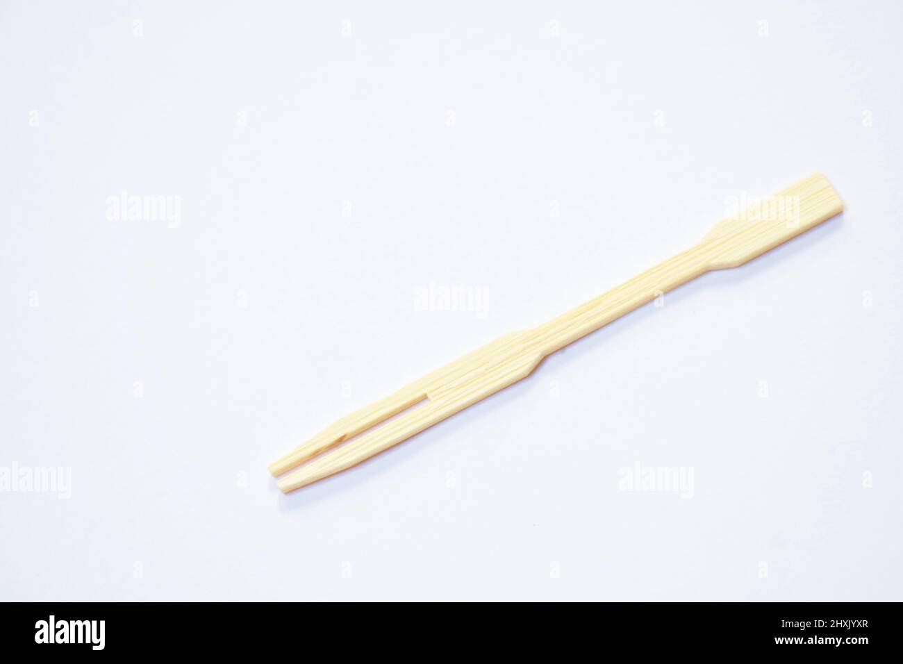 wooden fork for single used arranging on white background Stock Photo ...