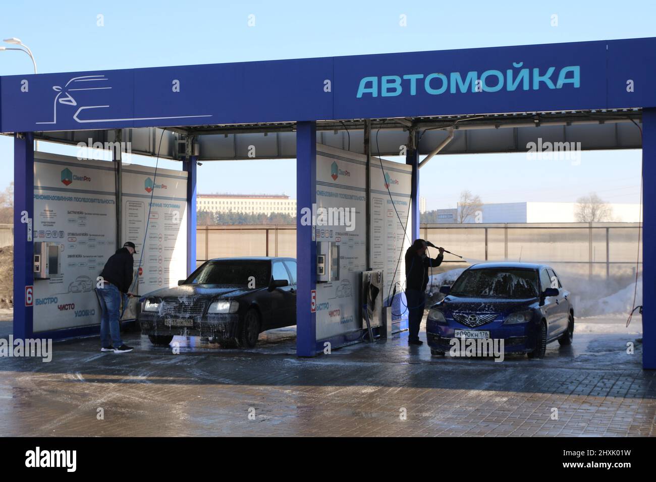 People seen washing their cars at a Self-service car wash in station ...