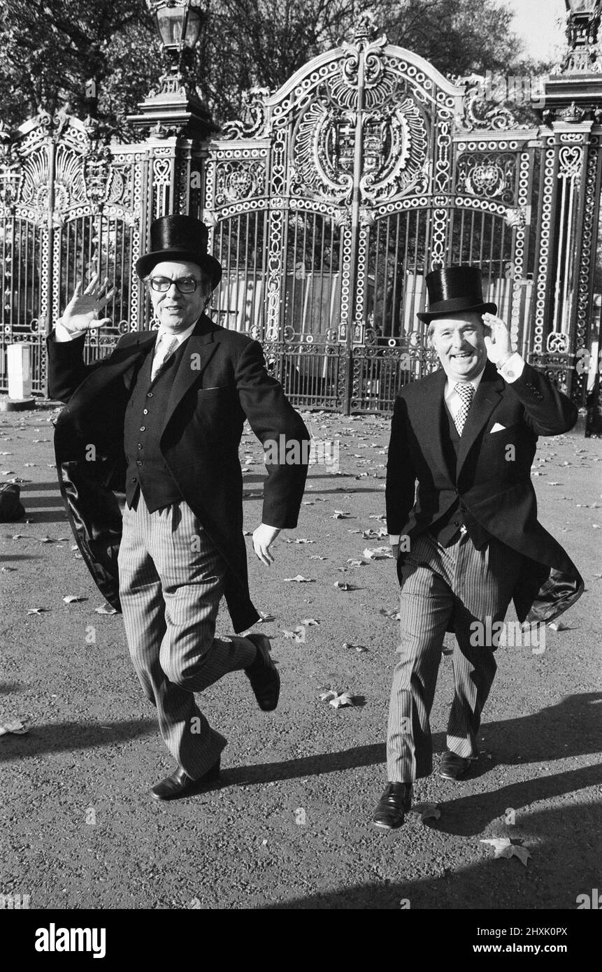 Morecambe and Wise seen here outside the gates of Buckingham Palace ...