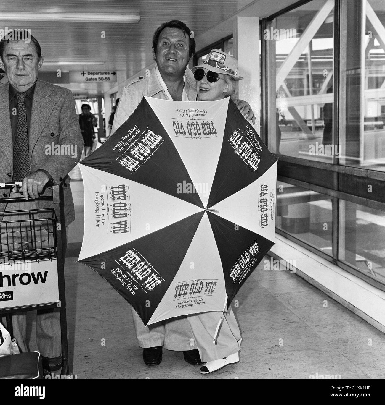 Terry Scott and June Whitfield arriving at Heathrow Airport from Hong ...