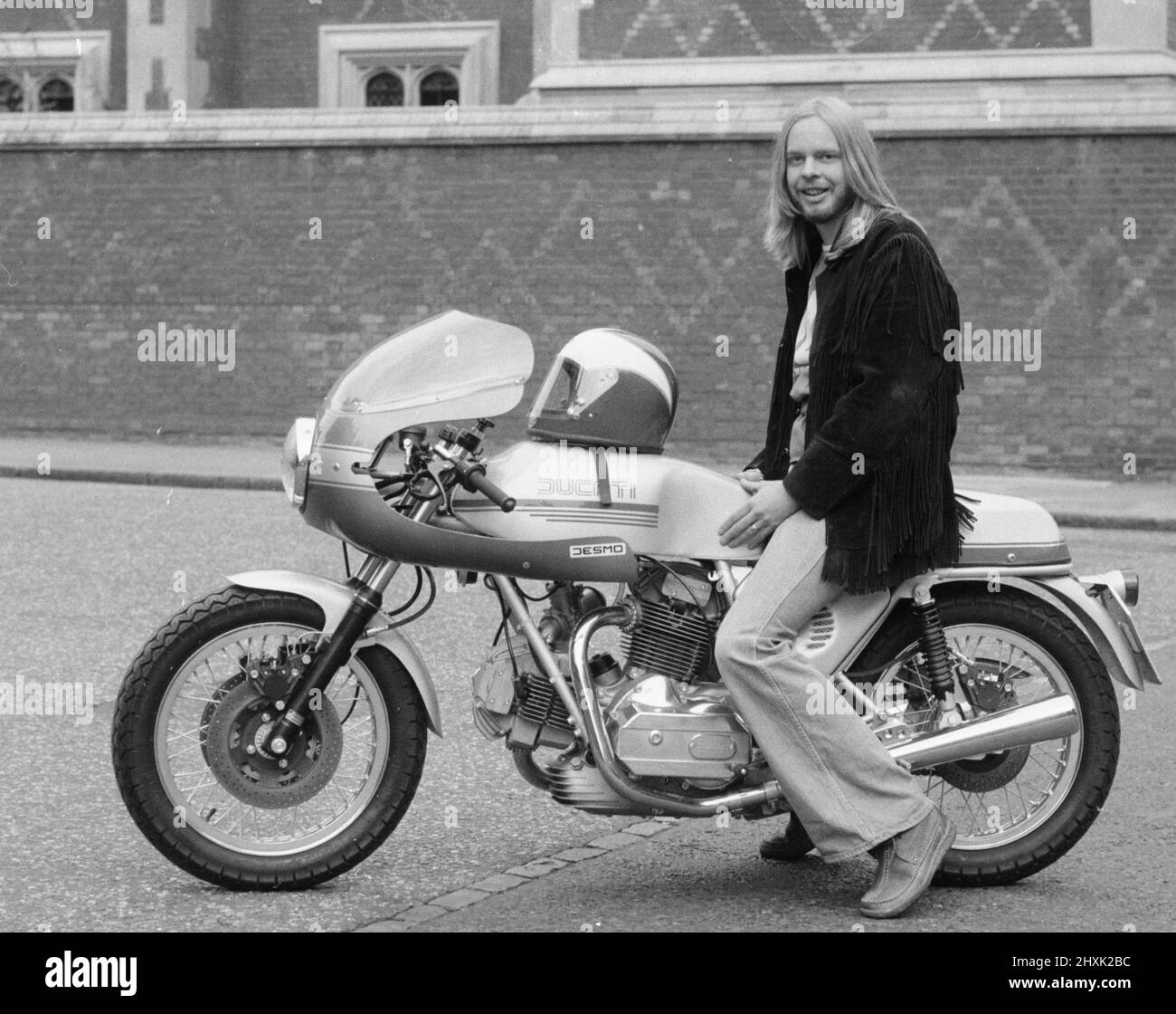 Yes keyboard player Rick Wakeman seen here riding a Ducati motorcycle ...