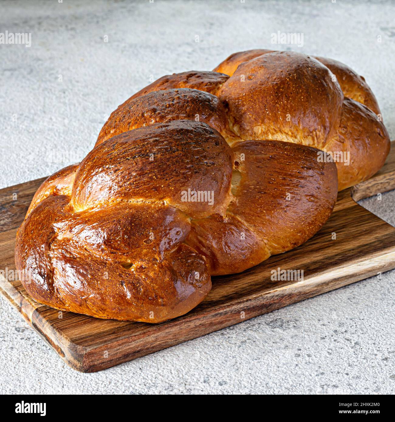 Challah or Hala is a traditional jewish sweet fresh sabbath Braided ...