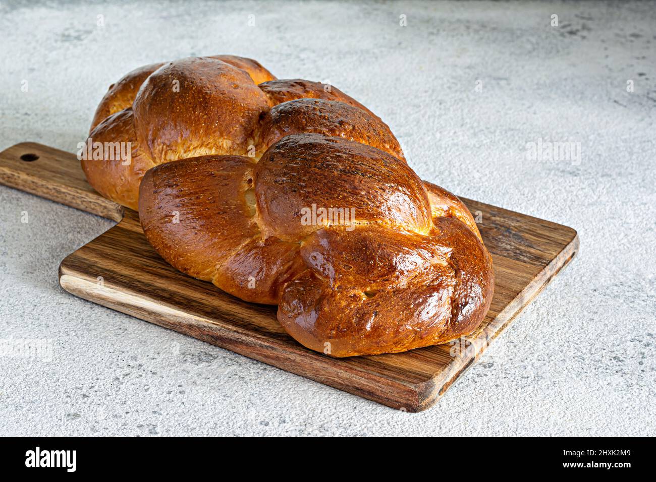 Challah or Hala is a traditional jewish sweet fresh sabbath Braided ...