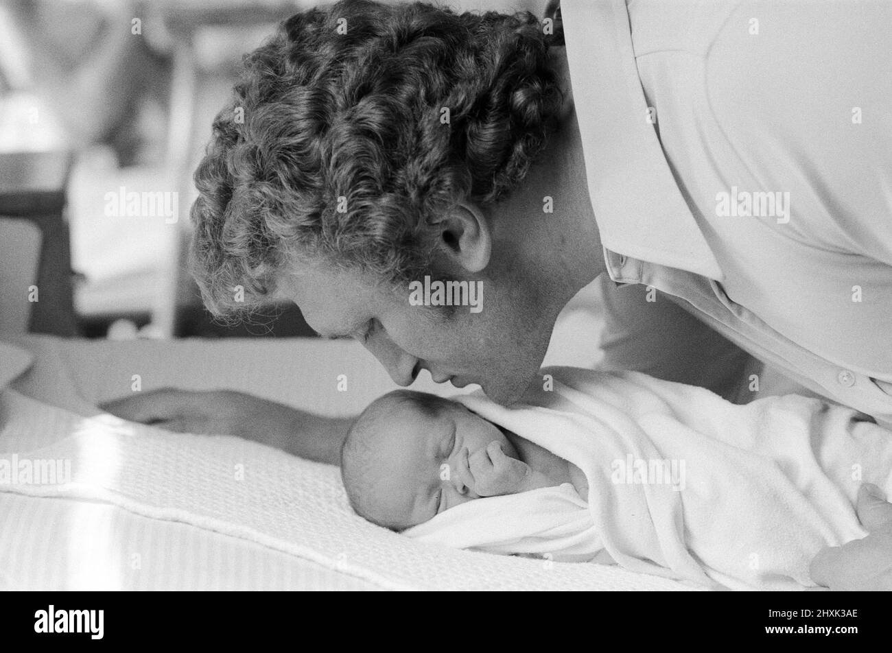 Former British European Heavyweight champion boxer Joe Bugner kisses ...
