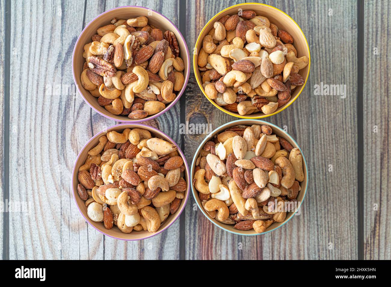 Bowl of assorted nuts ready to eat Stock Photo - Alamy