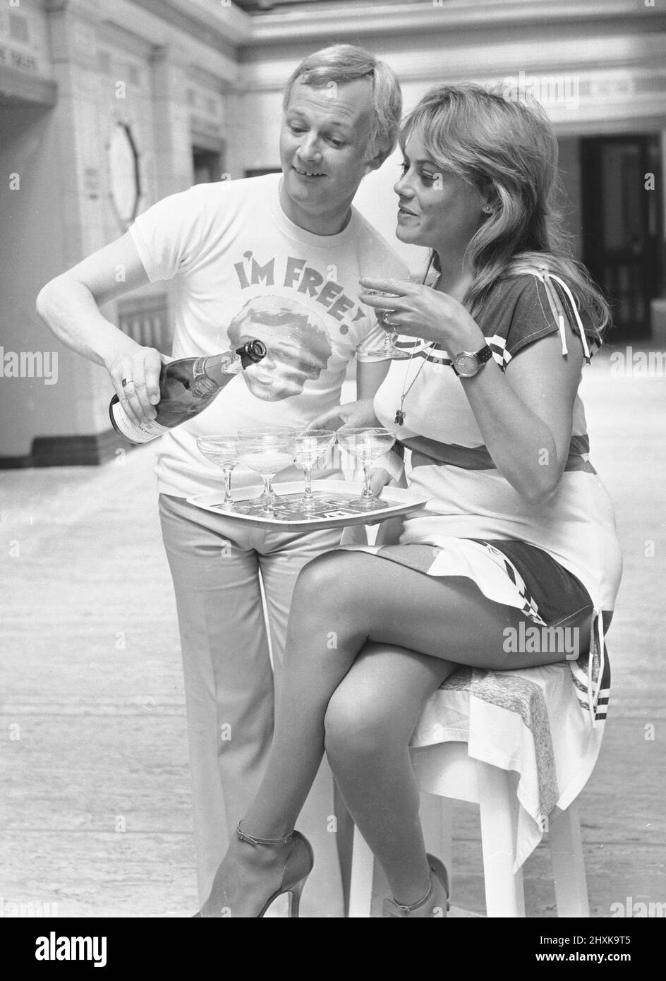 John Inman (Mr Humphries) and Wendy Richard (Miss Brahms) from the cast ...