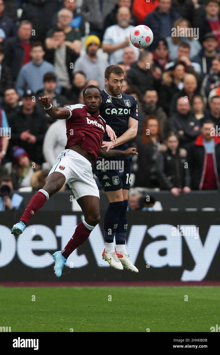 London, UK. 13th Mar, 2022. Calum Chambers of Aston Villa beats Michail ...