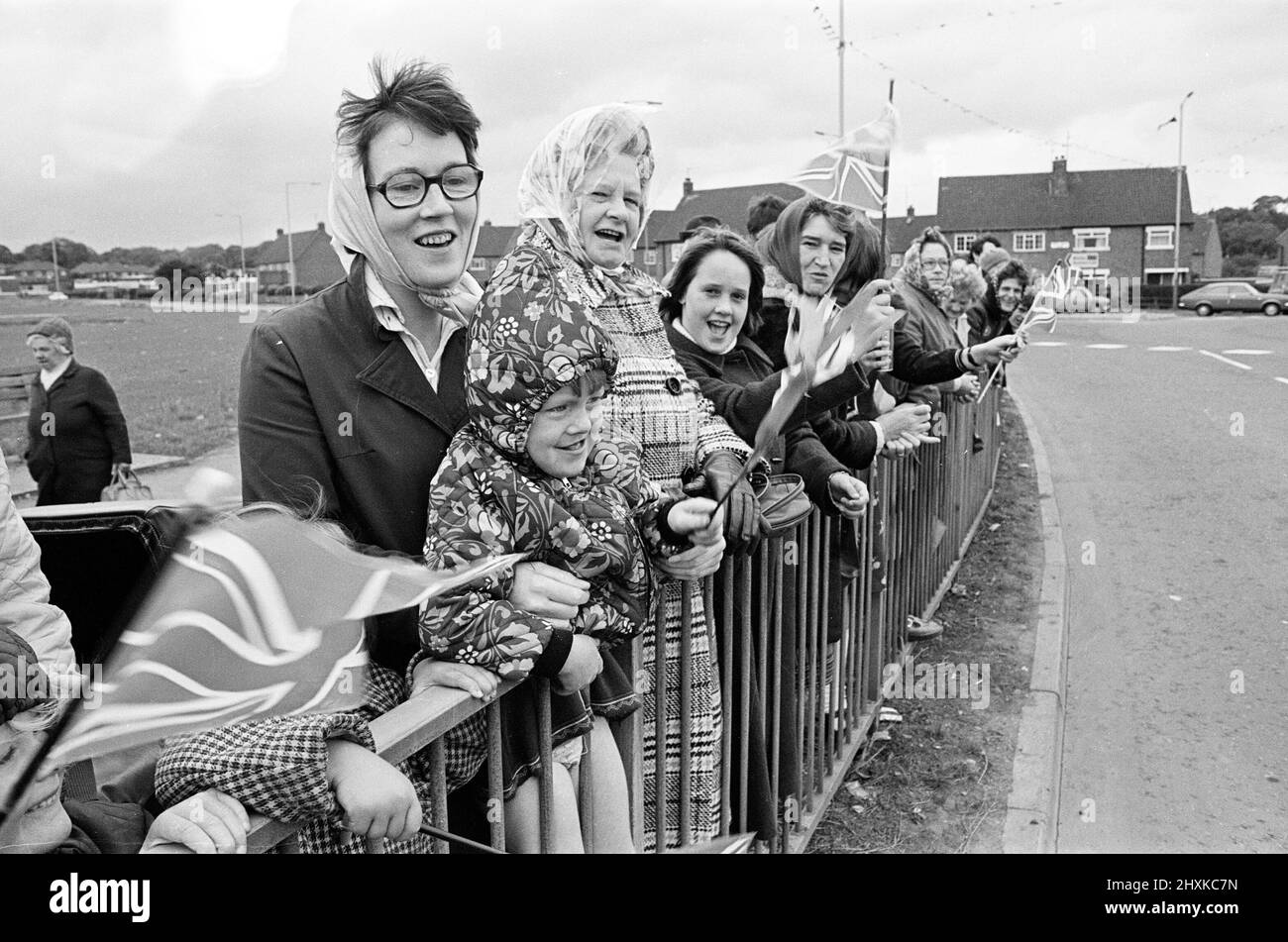 Spectators await Queen Elizabeth II in Eston during her Silver Jubilee ...