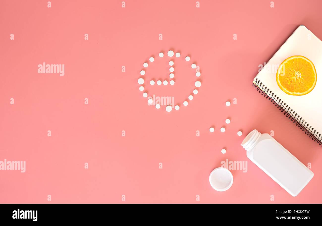 Flat lay, pills on a pink background, conceptual minimalism, medicine ...