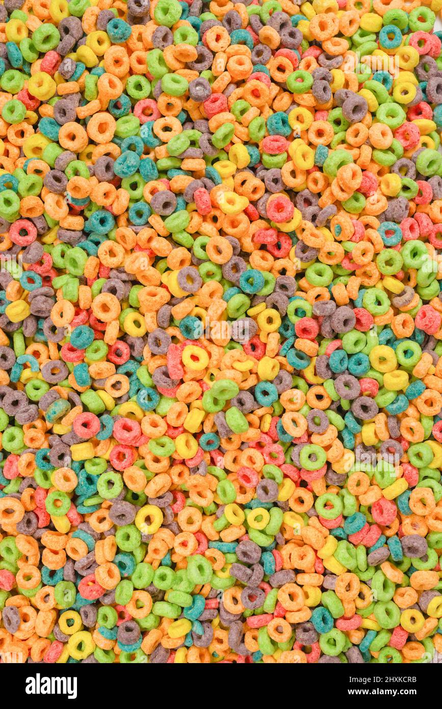 Sweet multicolored flakes, cereal loops as a background Stock Photo - Alamy