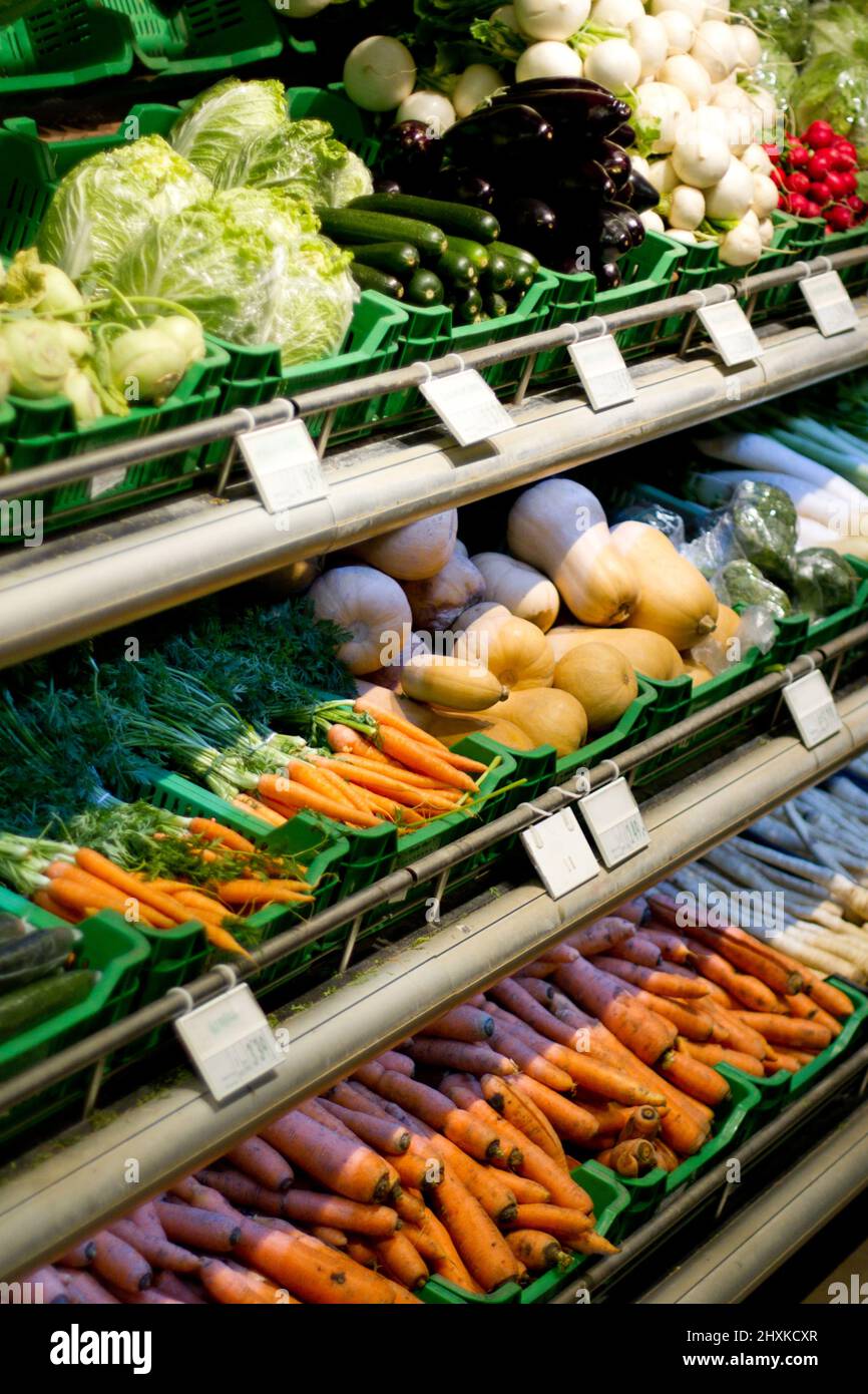 Fresh and ready to eat. Shelving in a grocery store filled with fresh ...