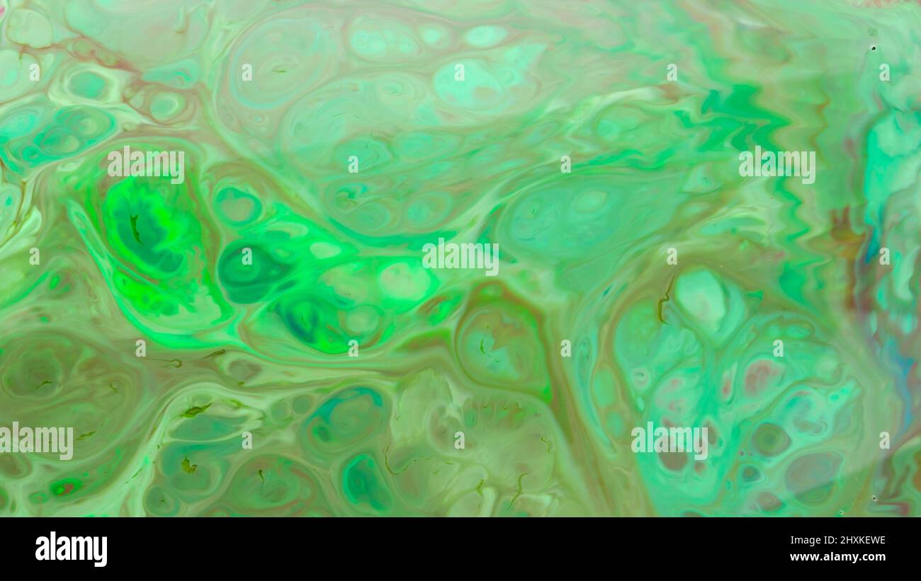 Psychedelic fluid art background. Multicolored stains on a liquid ...