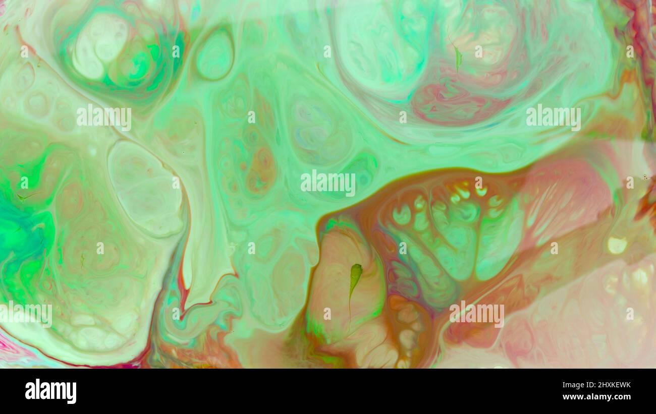 Psychedelic fluid art background. Multicolored stains on a liquid ...
